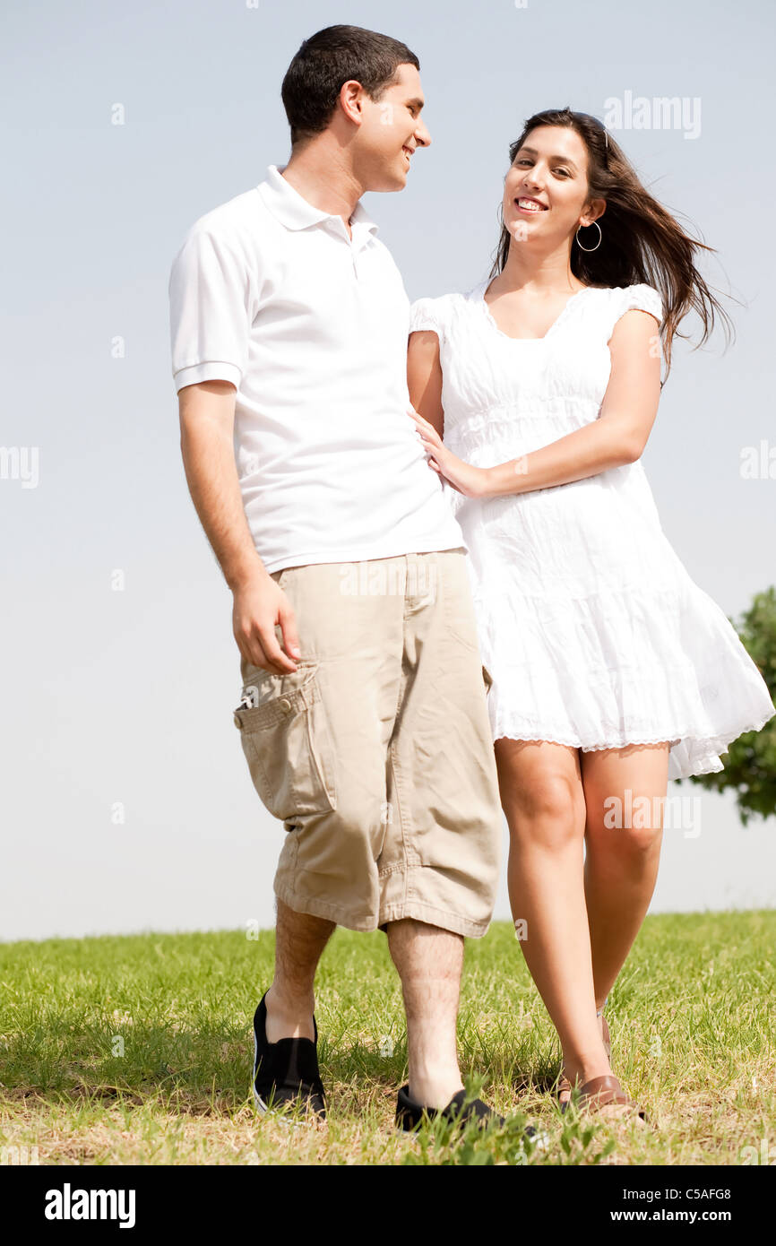 young love couple walk together and smiling Stock Photo - Alamy