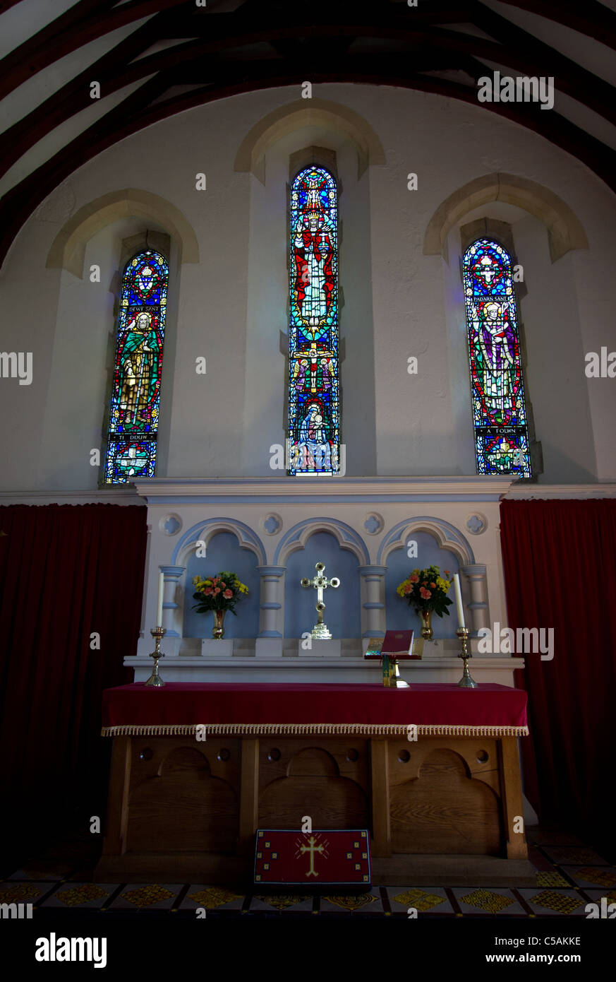 Altar and stained glass windows at St David's Church, Llanddewi-brefi ...