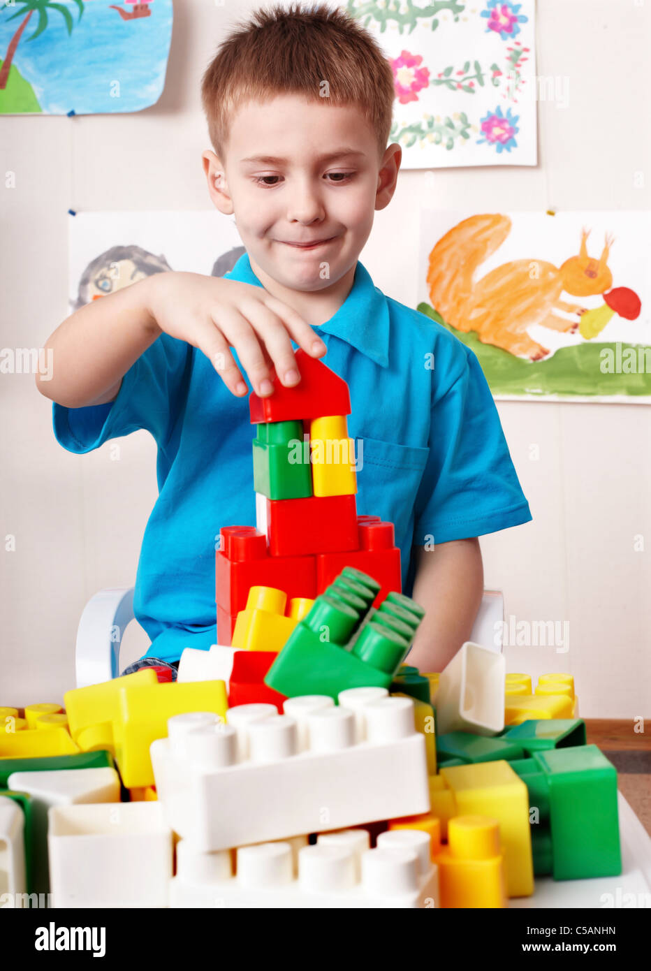 Child playing block and construction set Stock Photo - Alamy