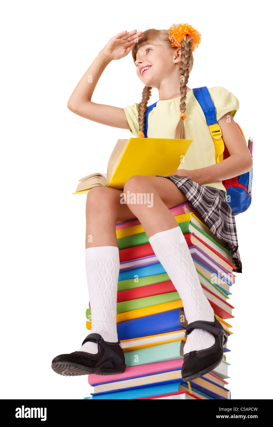 Child reading open book on table Stock Photo - Alamy