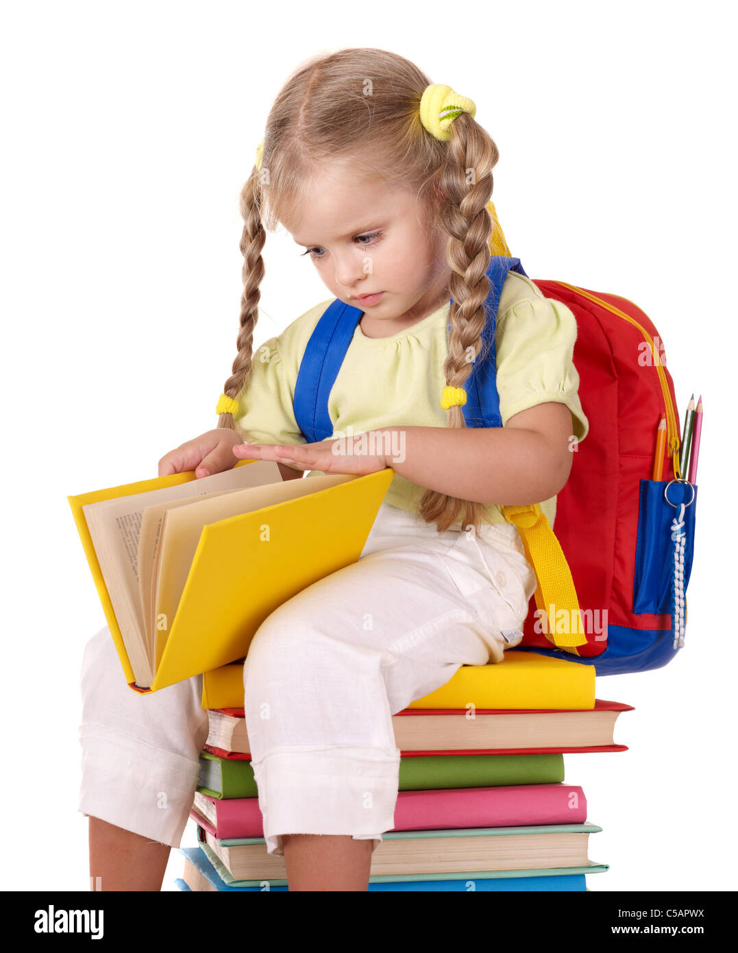 Child holding pile of books Stock Photo - Alamy