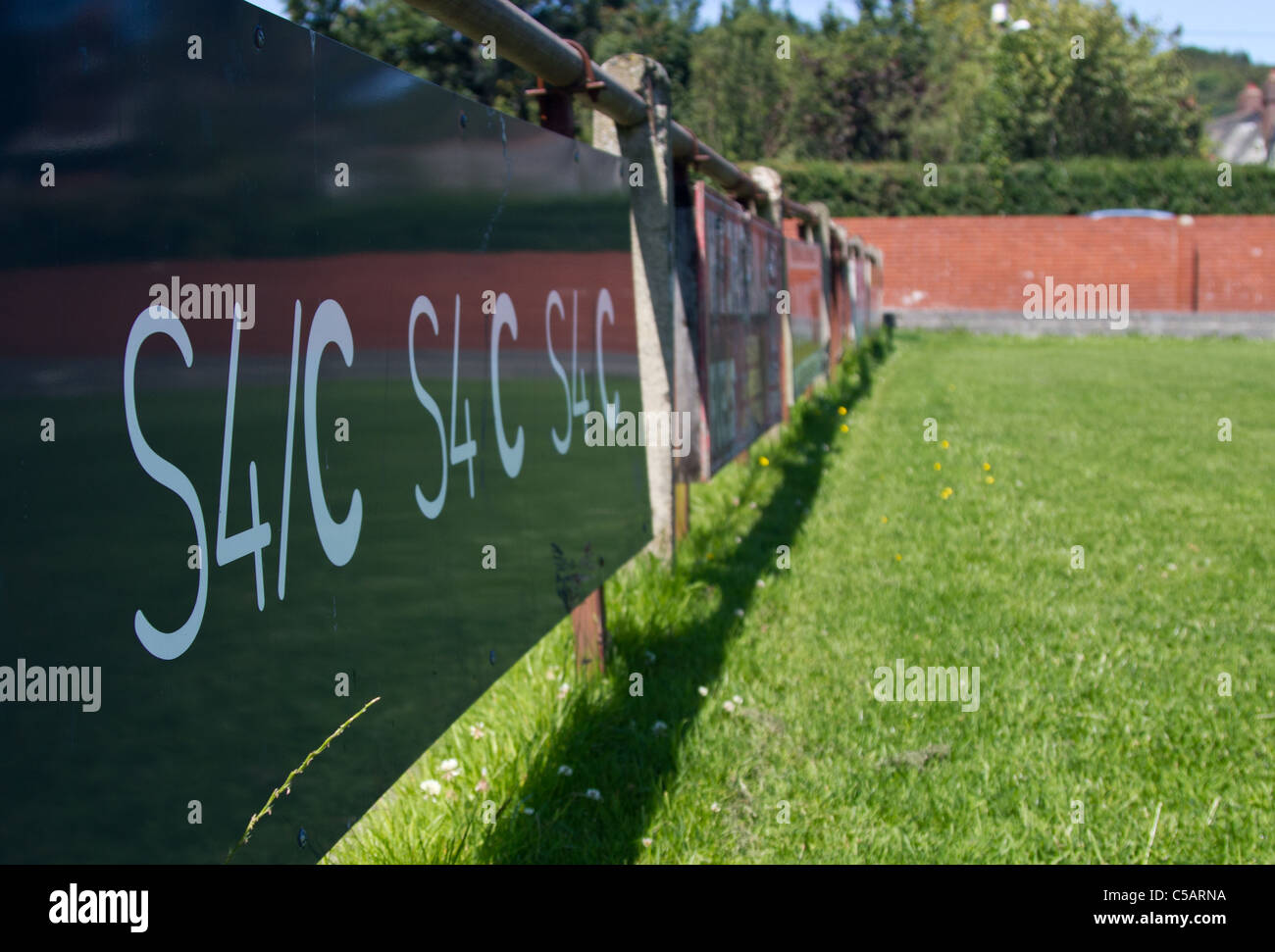S4C advertising board at Lampeter Rugby Club Stock Photo - Alamy