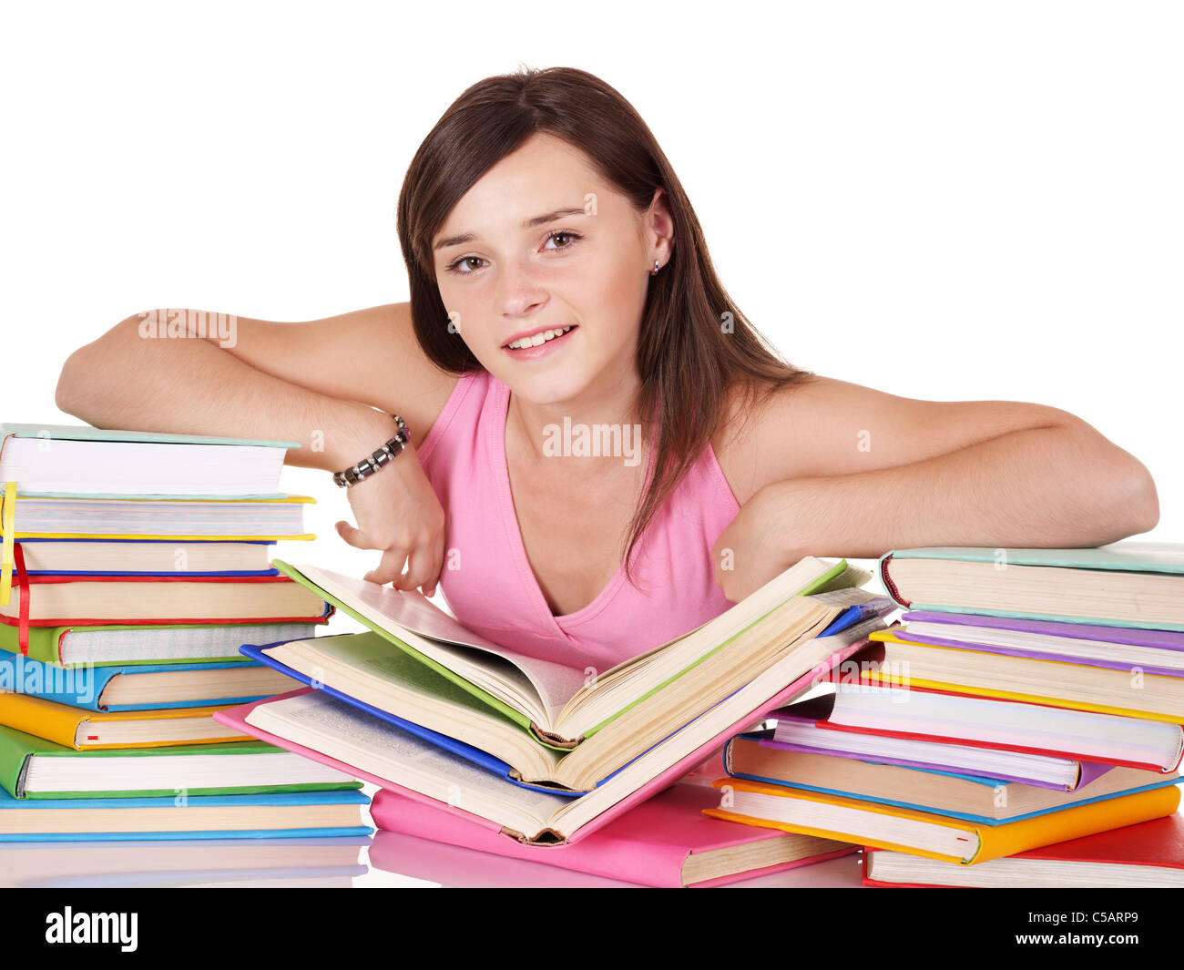 Girl with pile colored book Stock Photo - Alamy