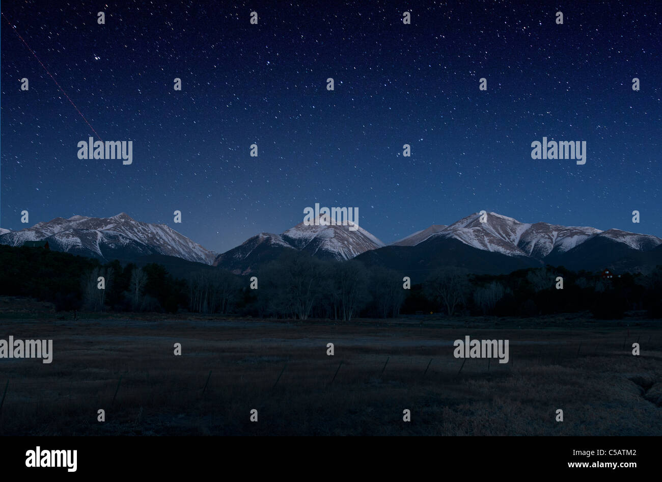 Full moon setting over Jones Peak (13,712'), Mt. White (13,667') & Mt ...