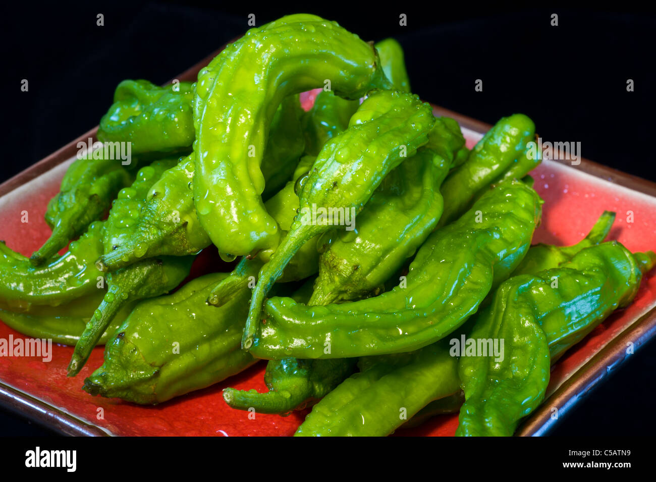 These are tasty Japanese peppers also known as Shishito Peppers Stock ...