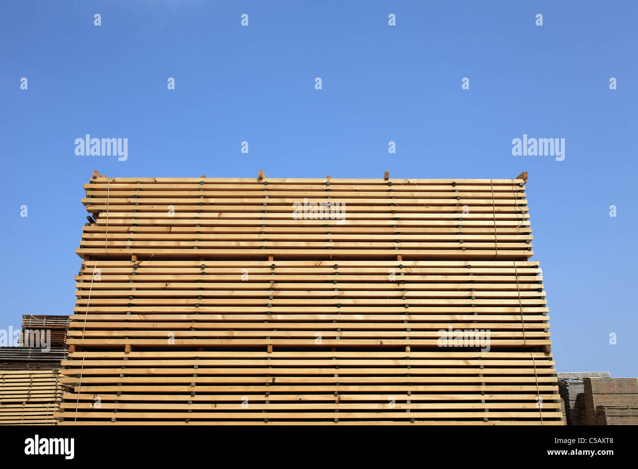 Stack of boards in lumber yard Stock Photo - Alamy