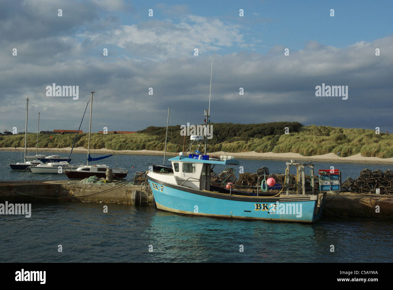 Fishing vessel moored in the harbour at Beadnell, Northumberland, other ...