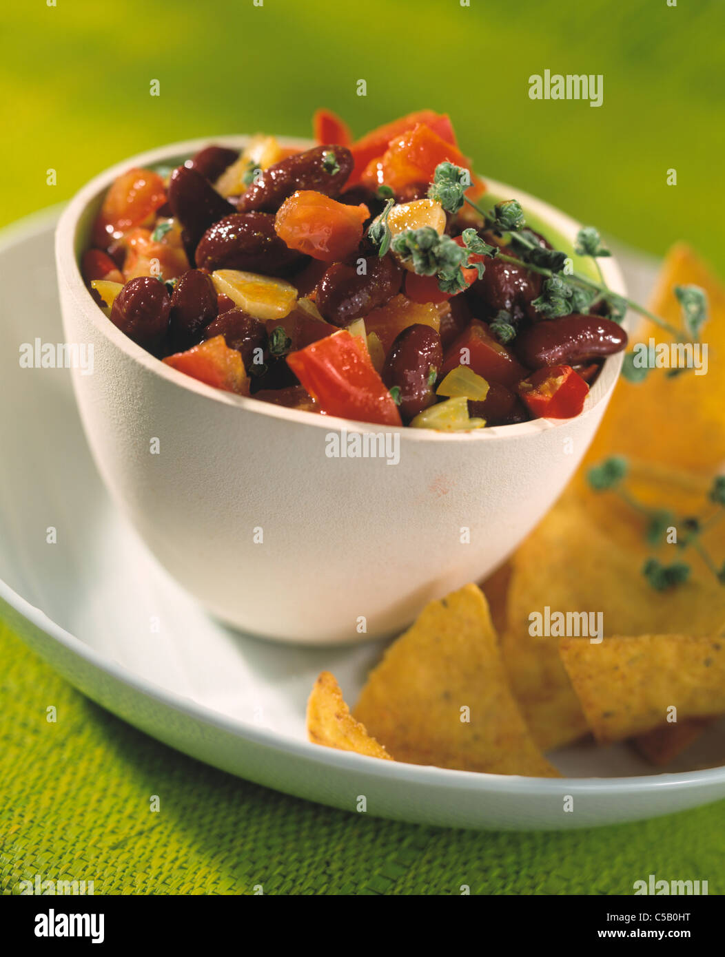 Hot beans with taco chips Stock Photo - Alamy