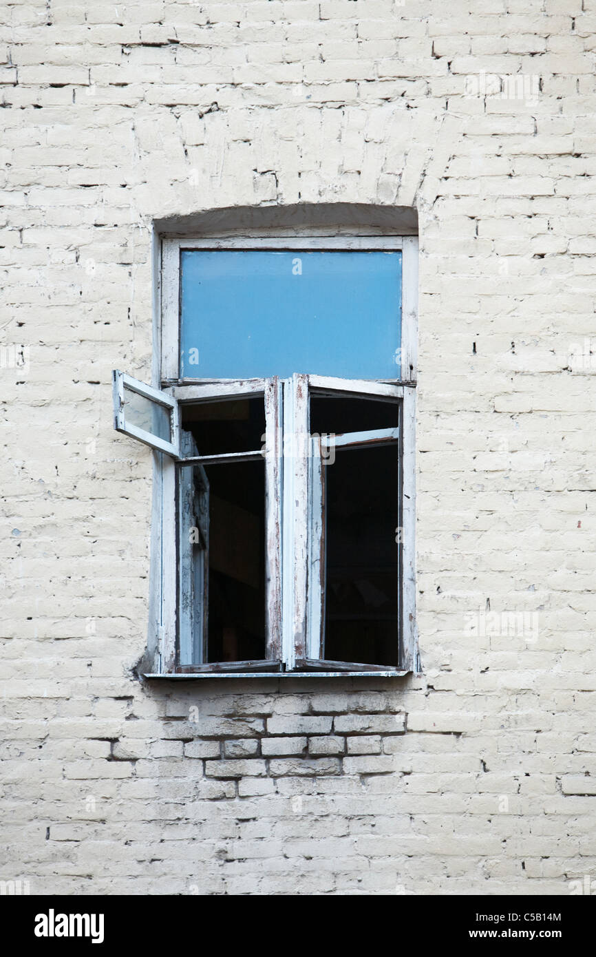An old broken window frame in abandoned building Stock Photo - Alamy