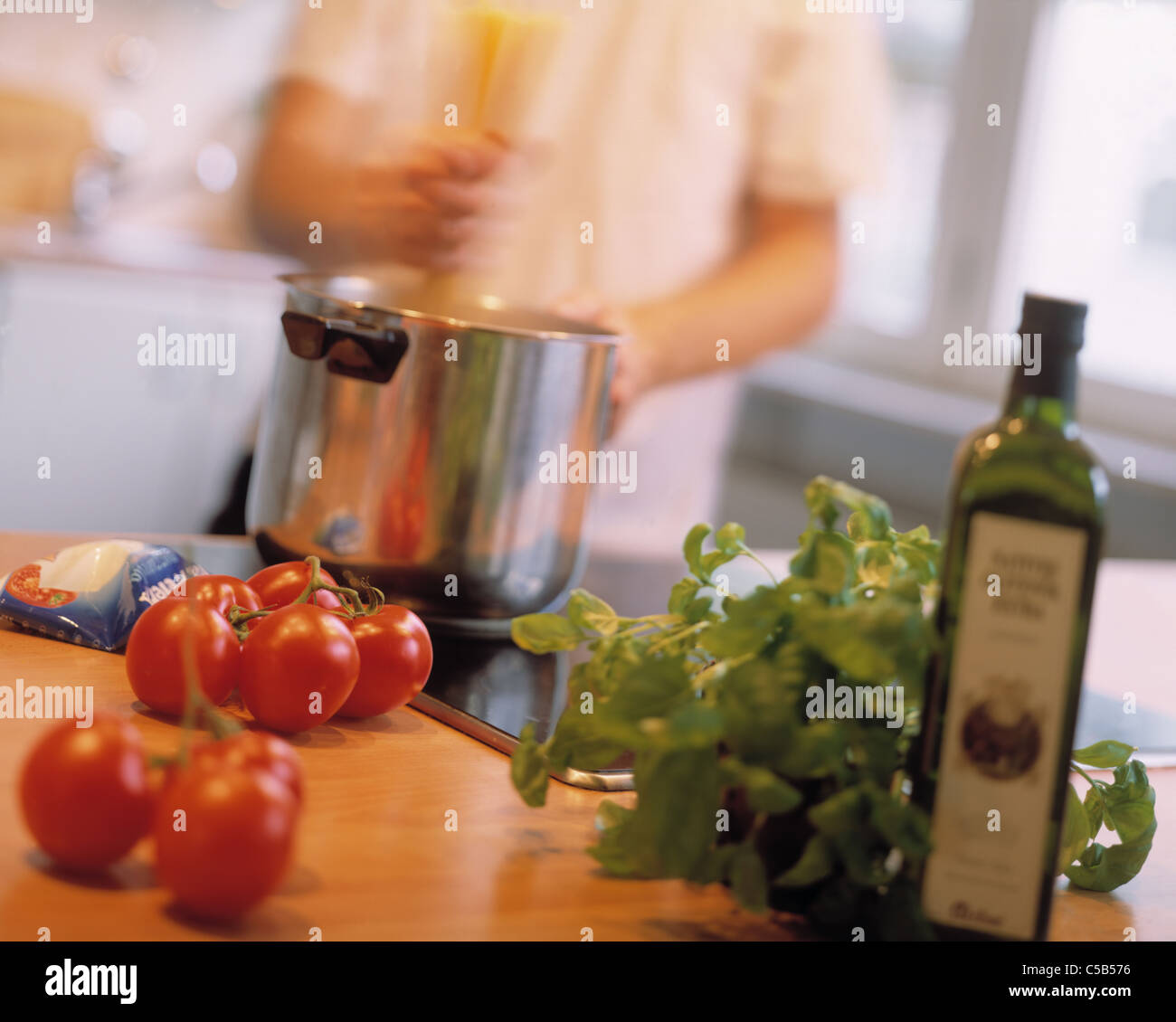 Still Italian kitchen: cooking pasta Stock Photo - Alamy