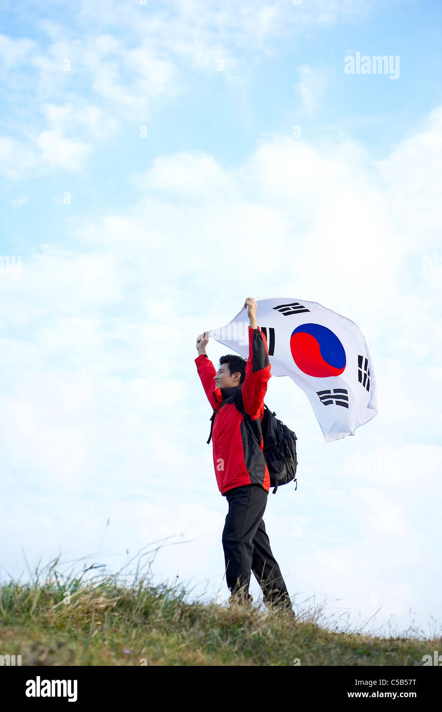 Man carrying flag hi-res stock photography and images - Alamy