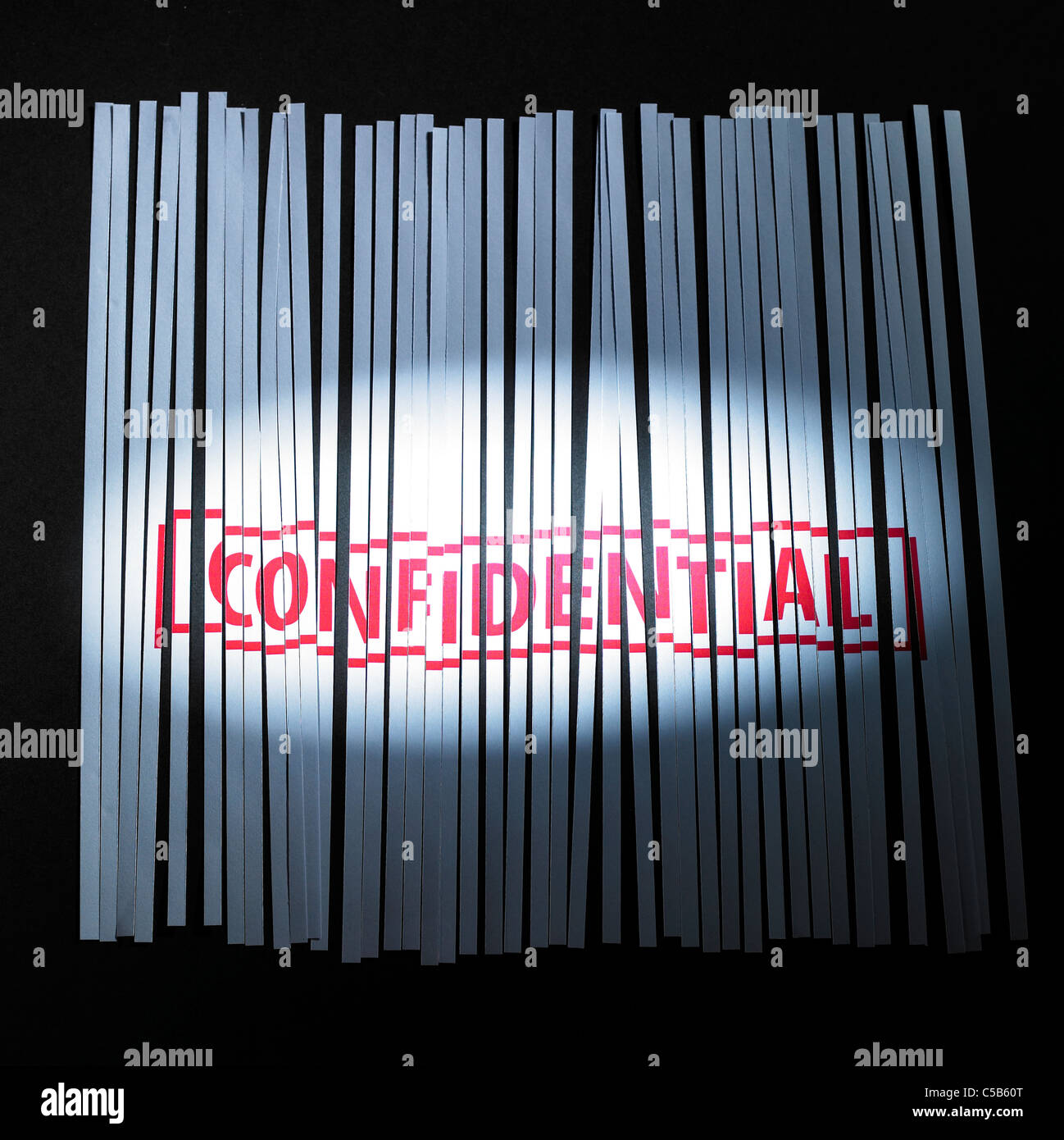 Close-up of Paper with confidential sign being shredded Stock Photo - Alamy