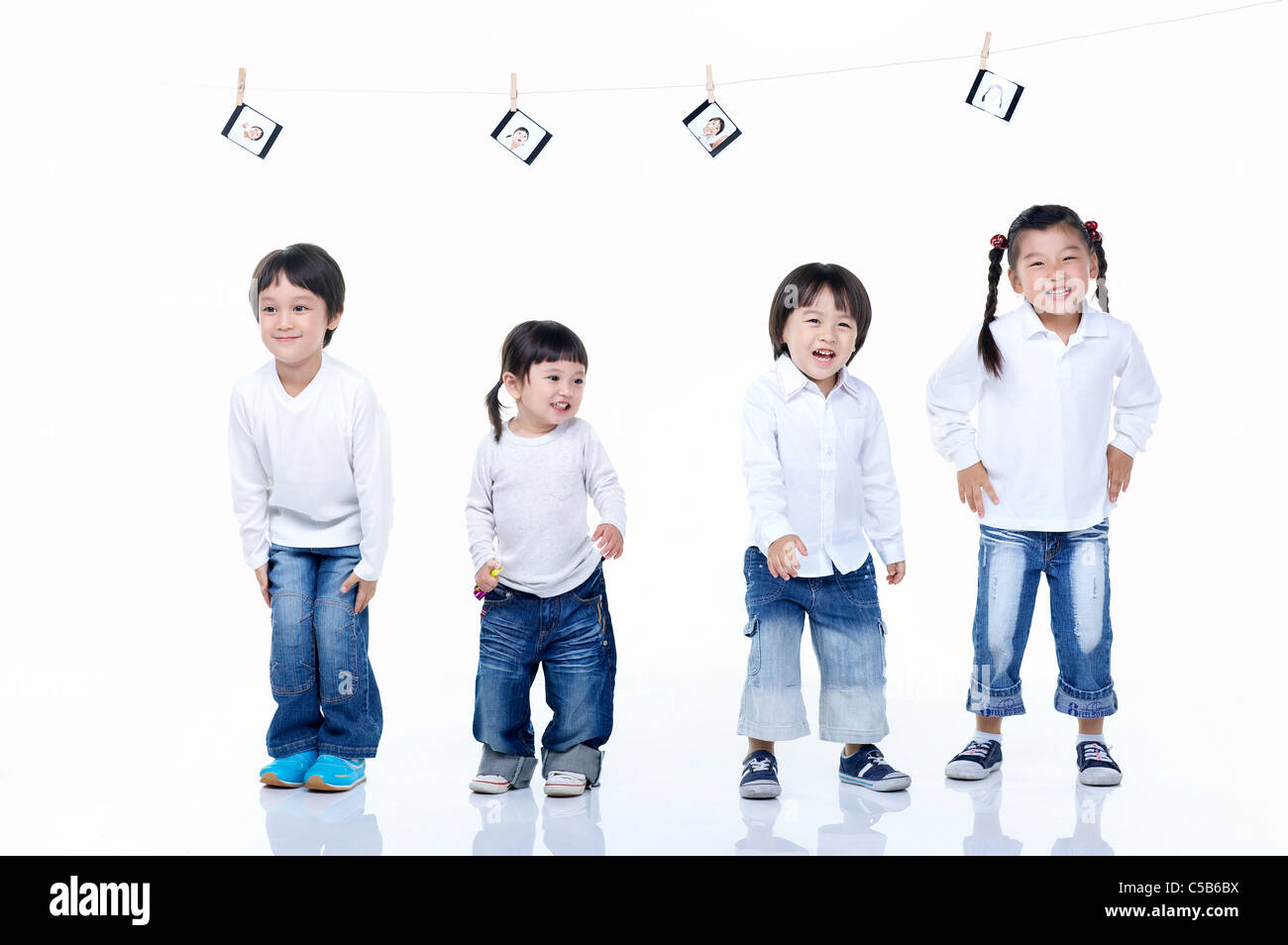 Close-up of children holding text Stock Photo - Alamy