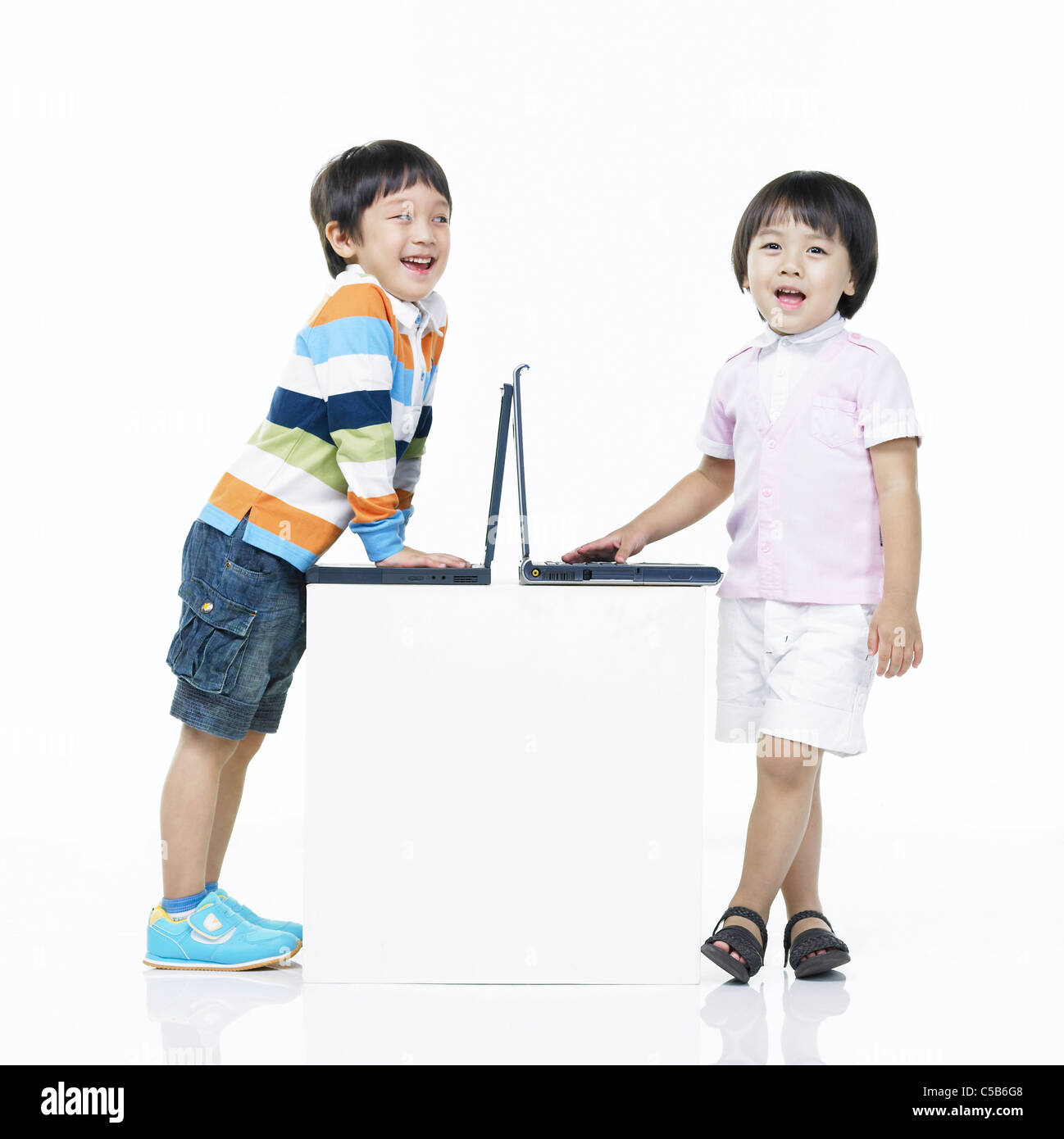 Close-up of children holding text Stock Photo - Alamy