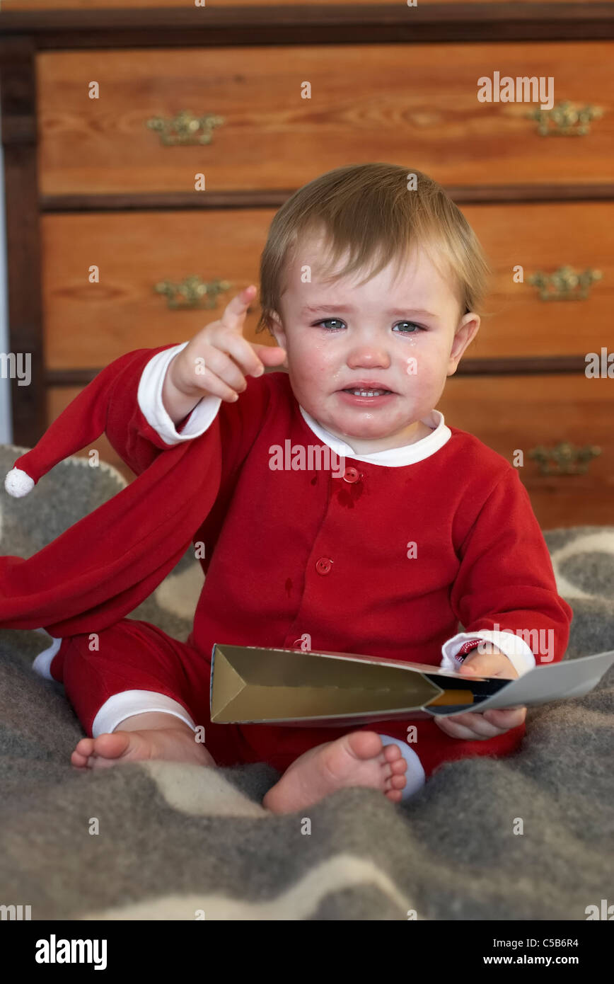 Child crying santa hi-res stock photography and images - Alamy
