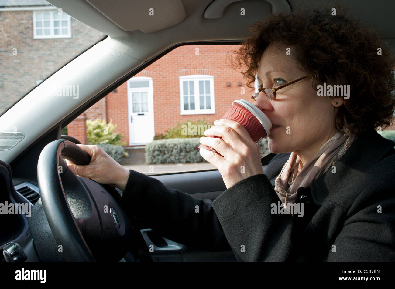 Woman uk car driving hi-res stock photography and images - Alamy