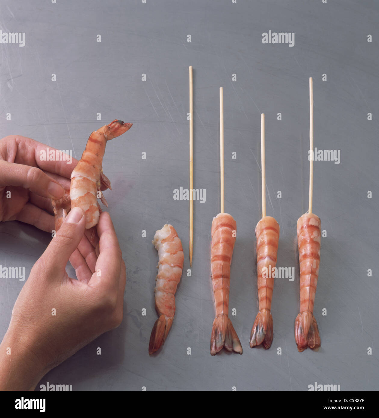 Peeling prawns hi-res stock photography and images - Alamy