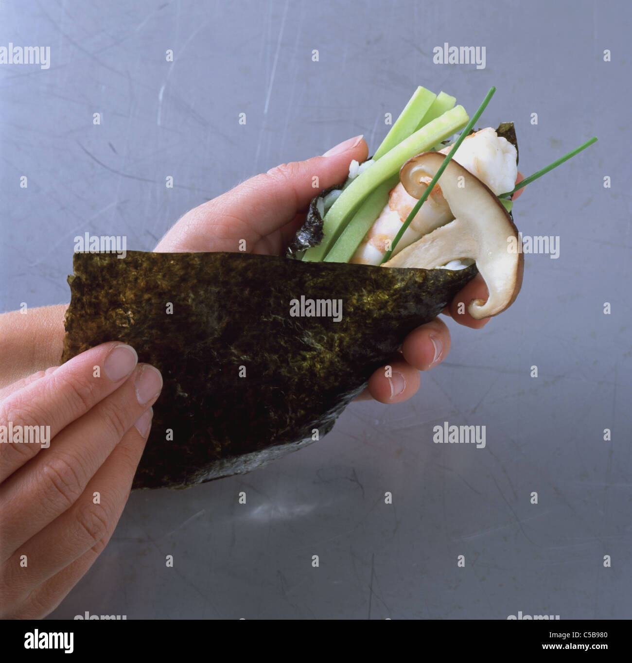 Forming nori leaf to a cone hi-res stock photography and images - Alamy