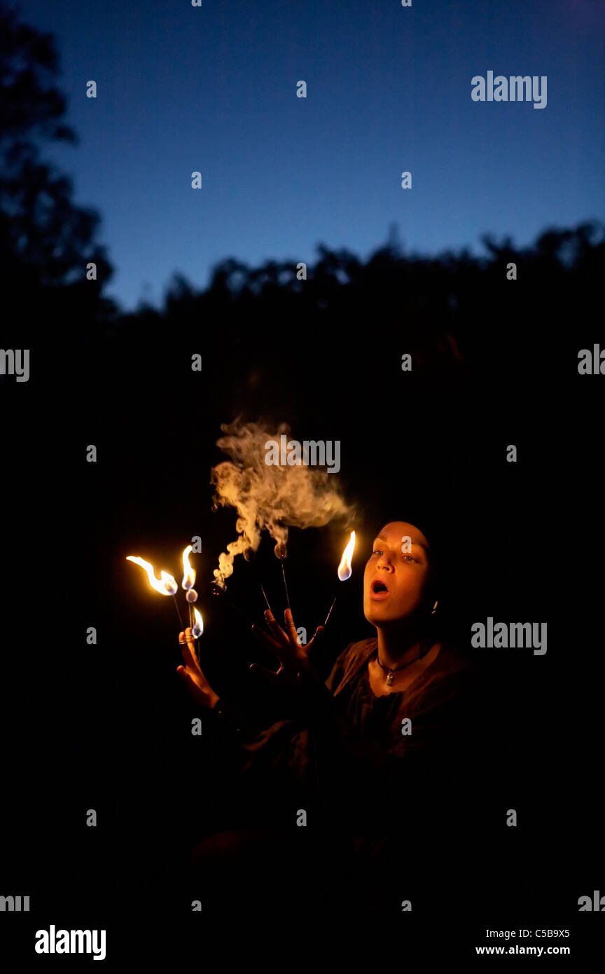 Blowing smoke in face hi-res stock photography and images - Alamy
