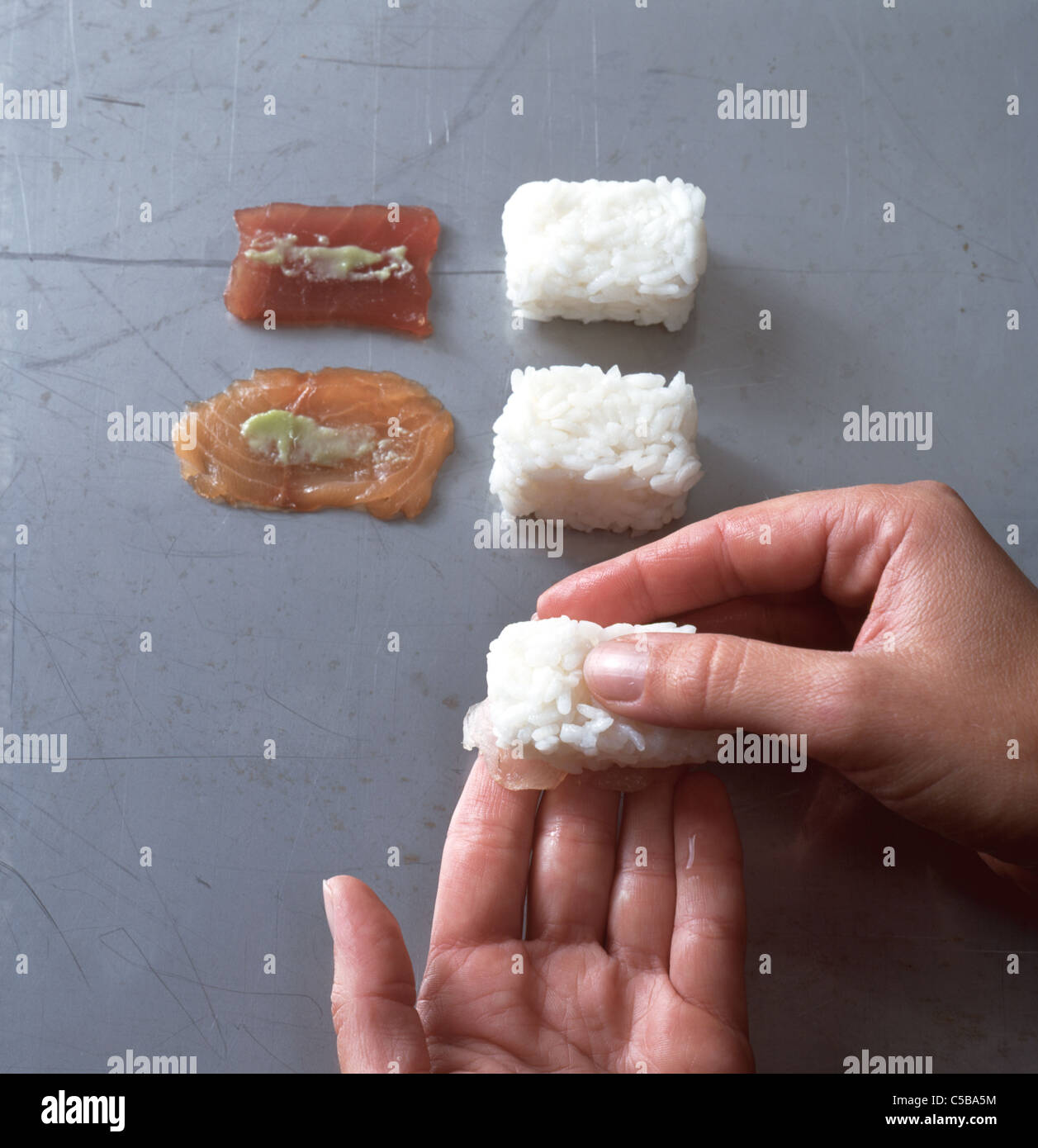 Fixing fish and rice hi-res stock photography and images - Alamy