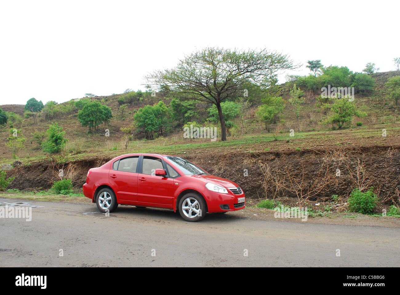 Red car hi-res stock photography and images - Alamy