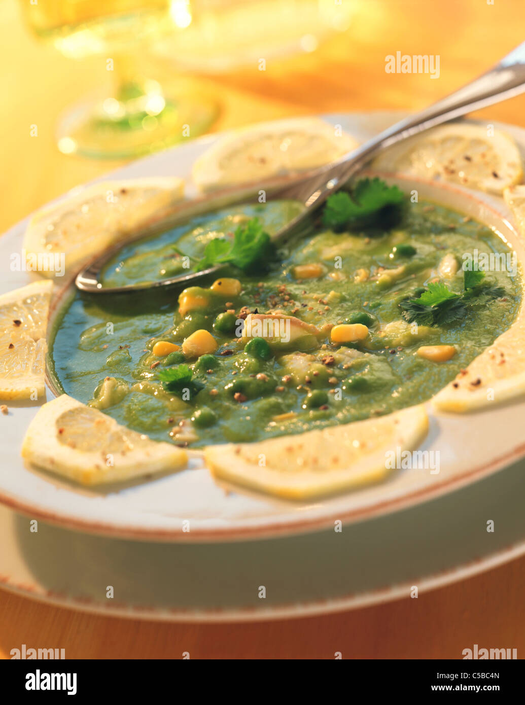Fresh greenpeas - soup with monkfish (anglerfish Stock Photo - Alamy