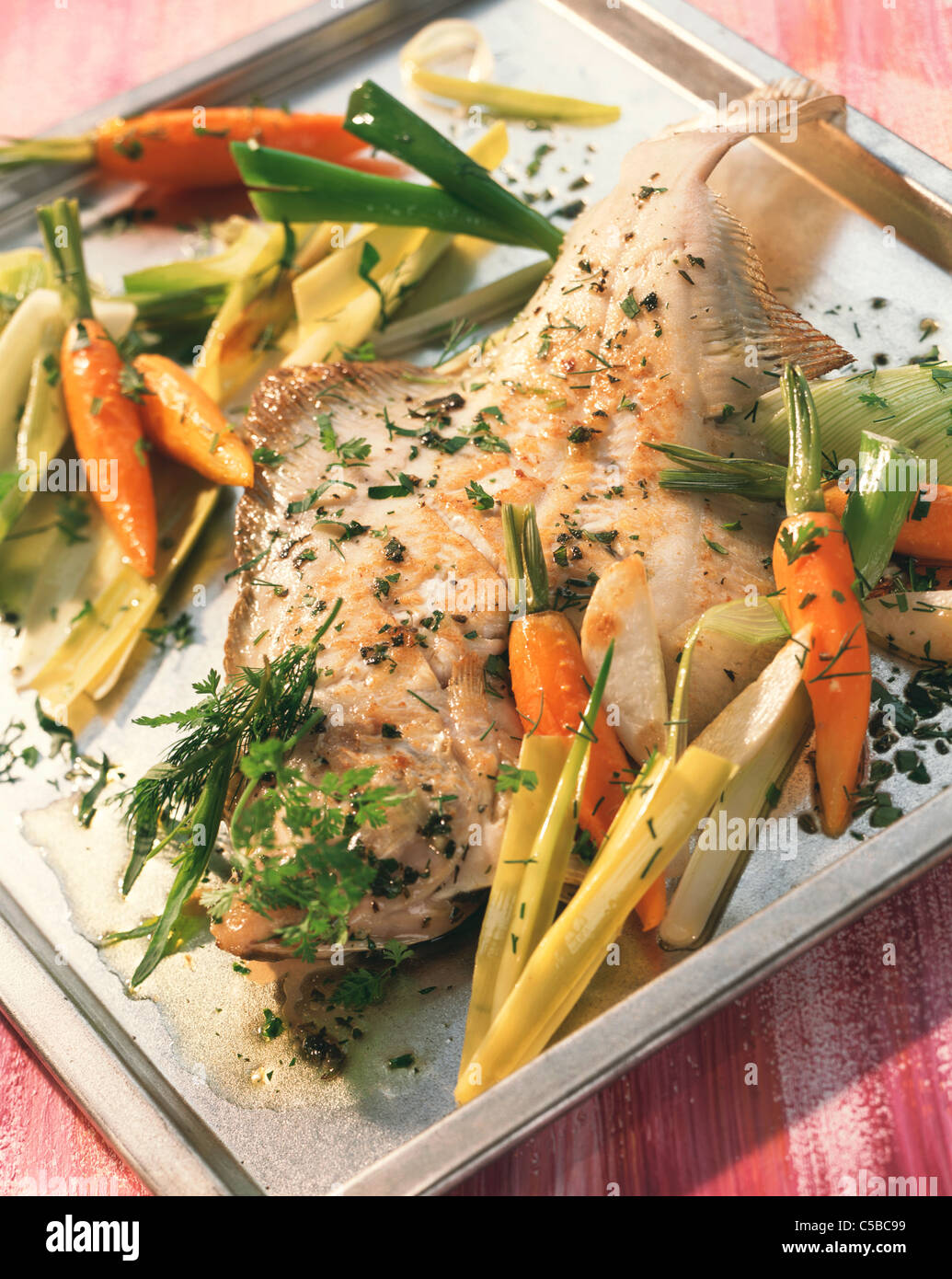 Plaice with vegetables Stock Photo - Alamy