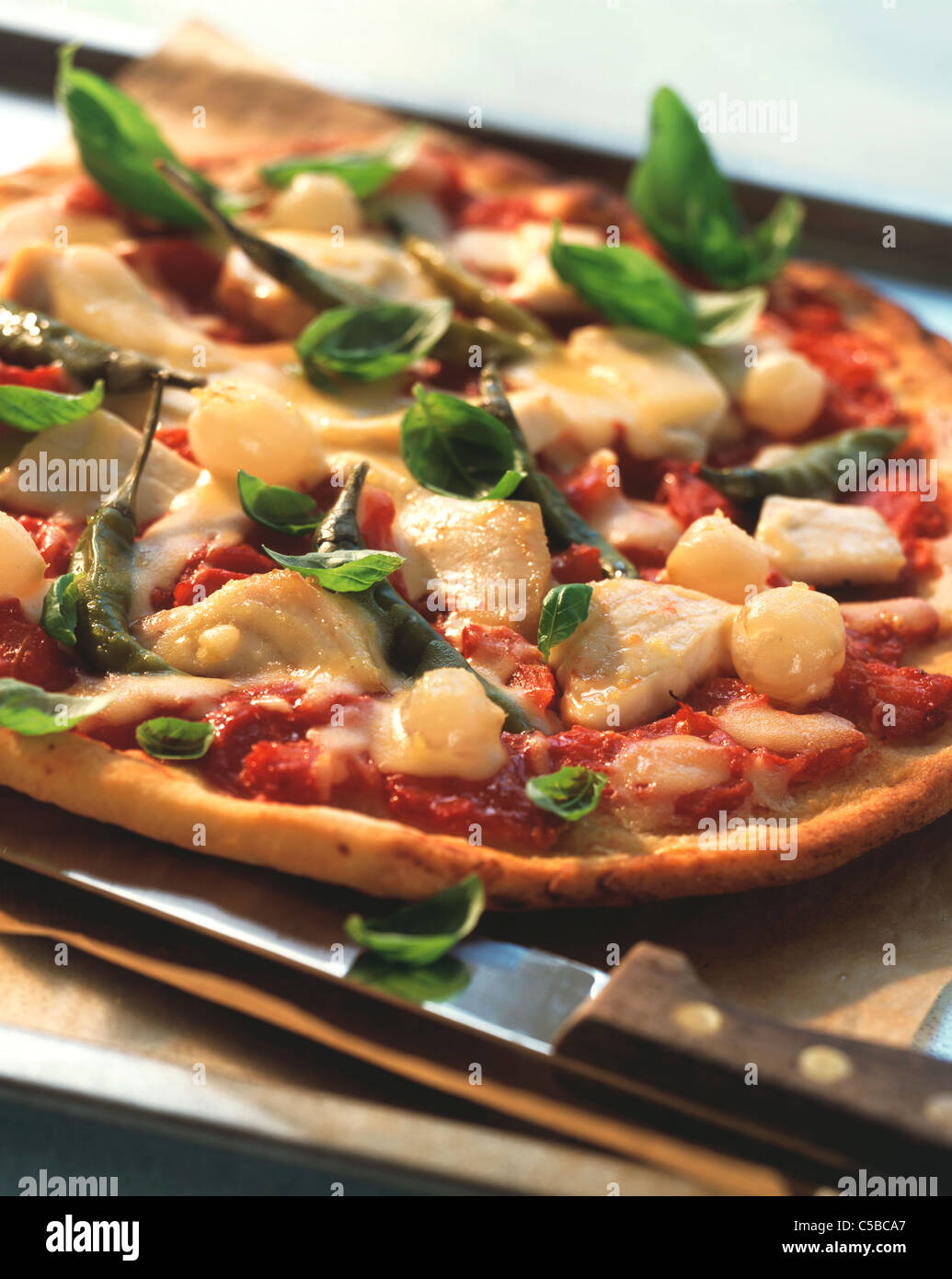 Pizza with swordfish Stock Photo - Alamy
