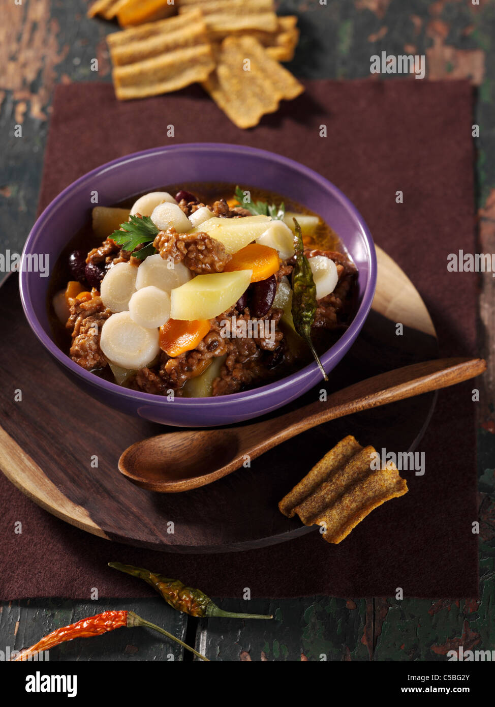 Chili con carne with root vegetables Stock Photo - Alamy