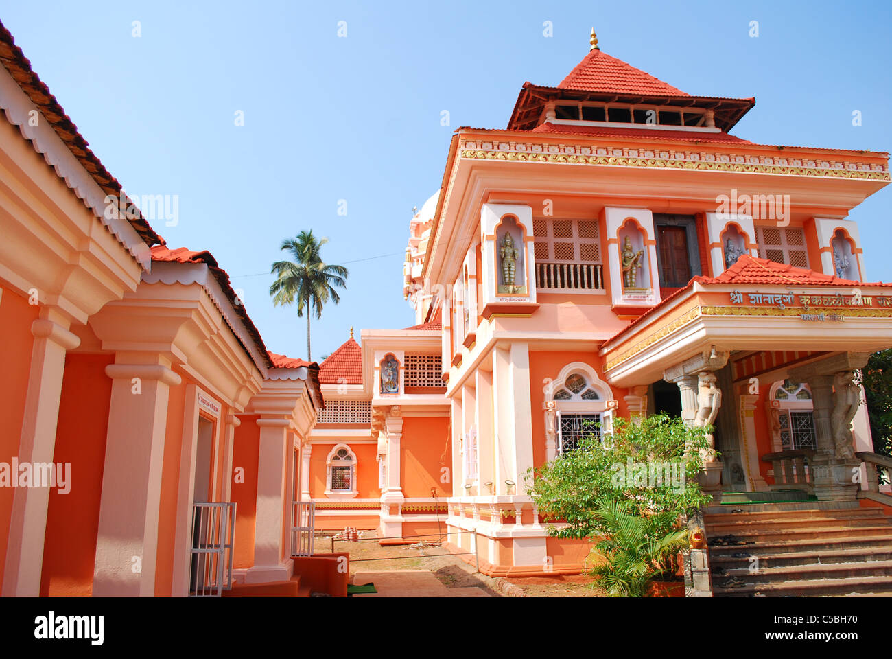 front view of shantadurga temple in goa Stock Photo - Alamy