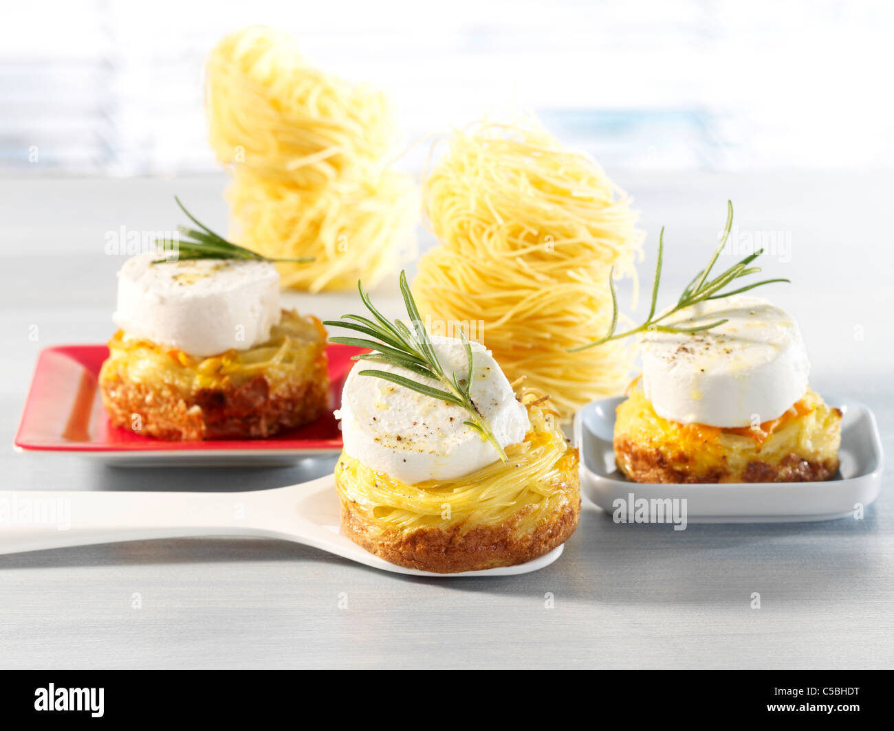 Pasta nests au gratin Stock Photo - Alamy