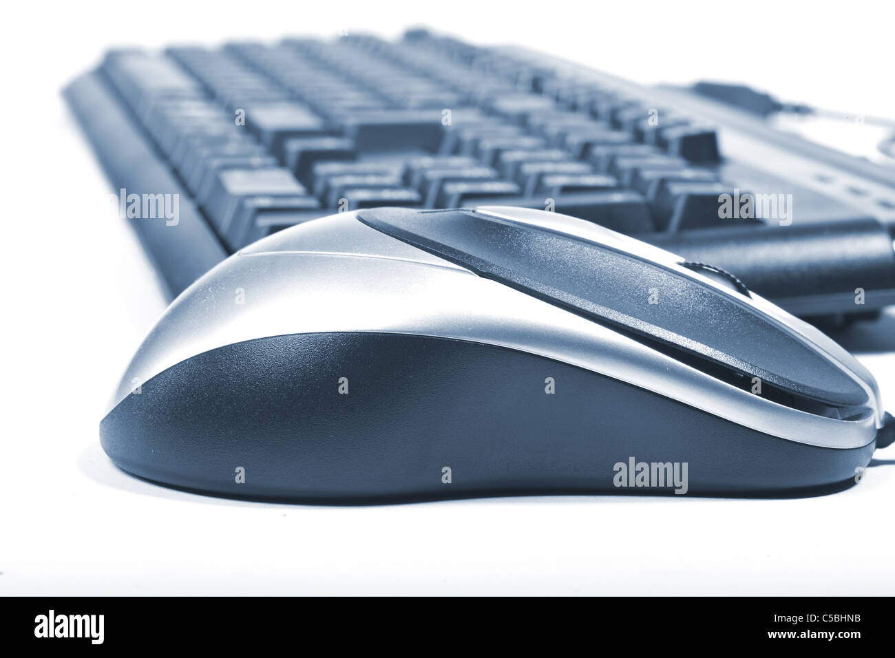 Black mouse on black keyboard Stock Photo - Alamy