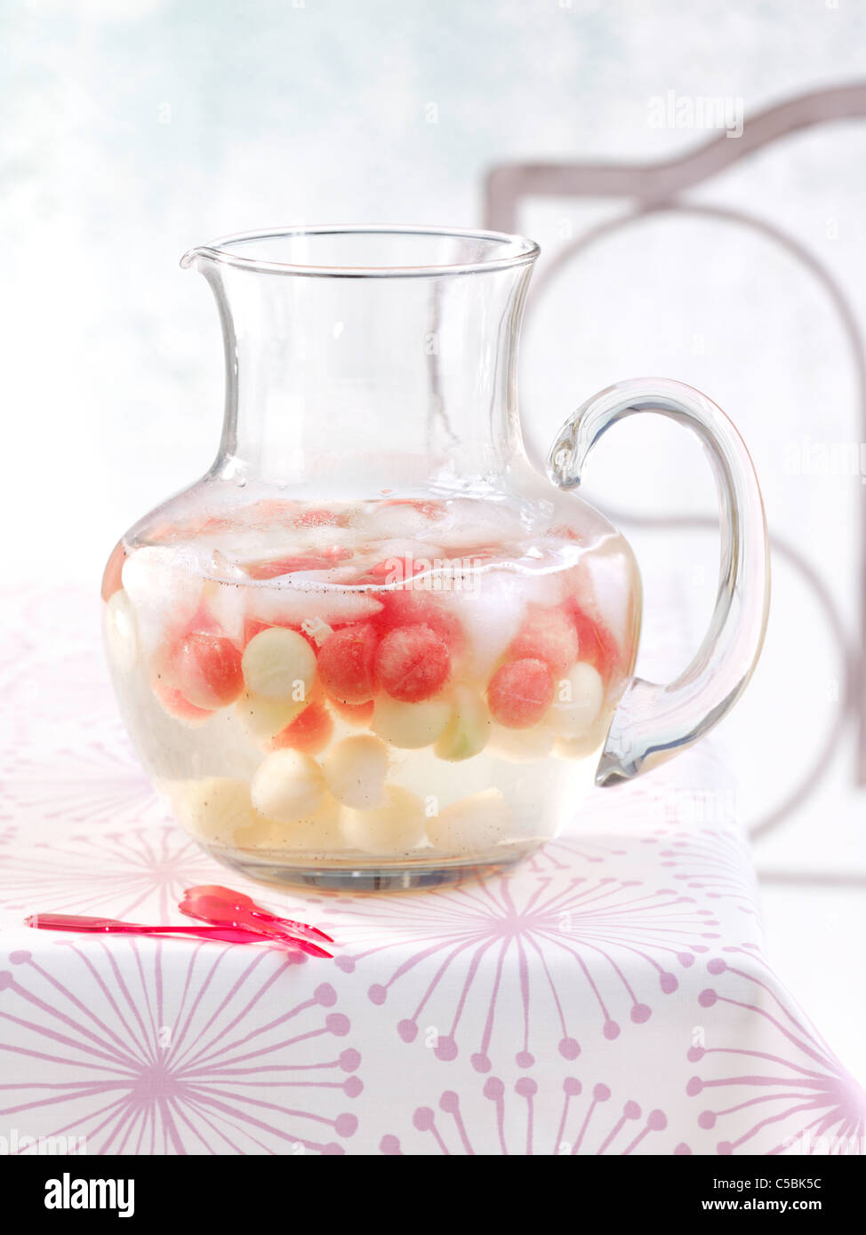 Melon punch in a carafe Stock Photo - Alamy
