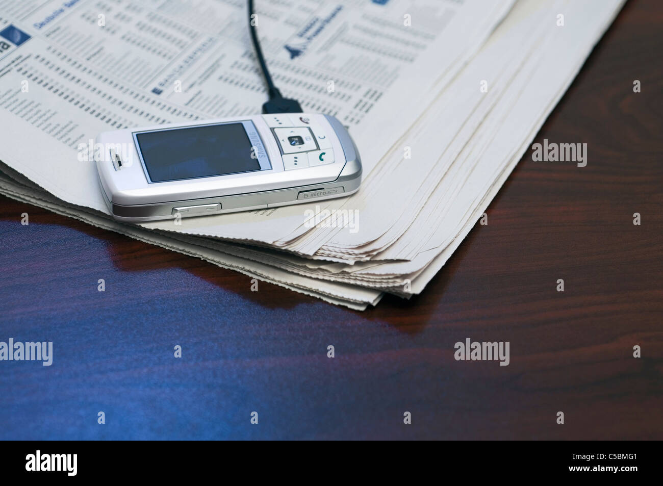 Telephone newspaper hi-res stock photography and images - Alamy