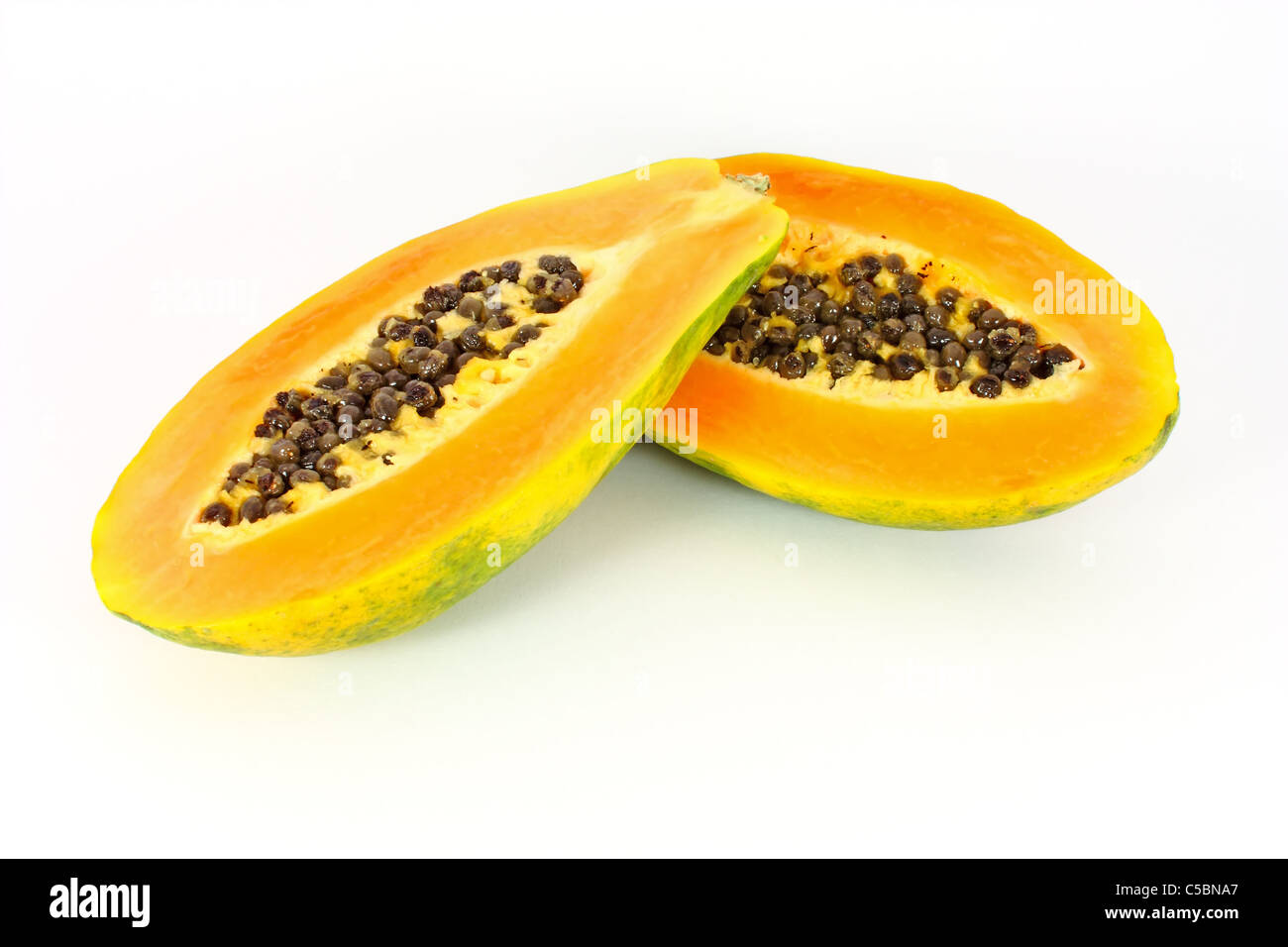 Ripe papaya fruit isolated on white background Stock Photo - Alamy
