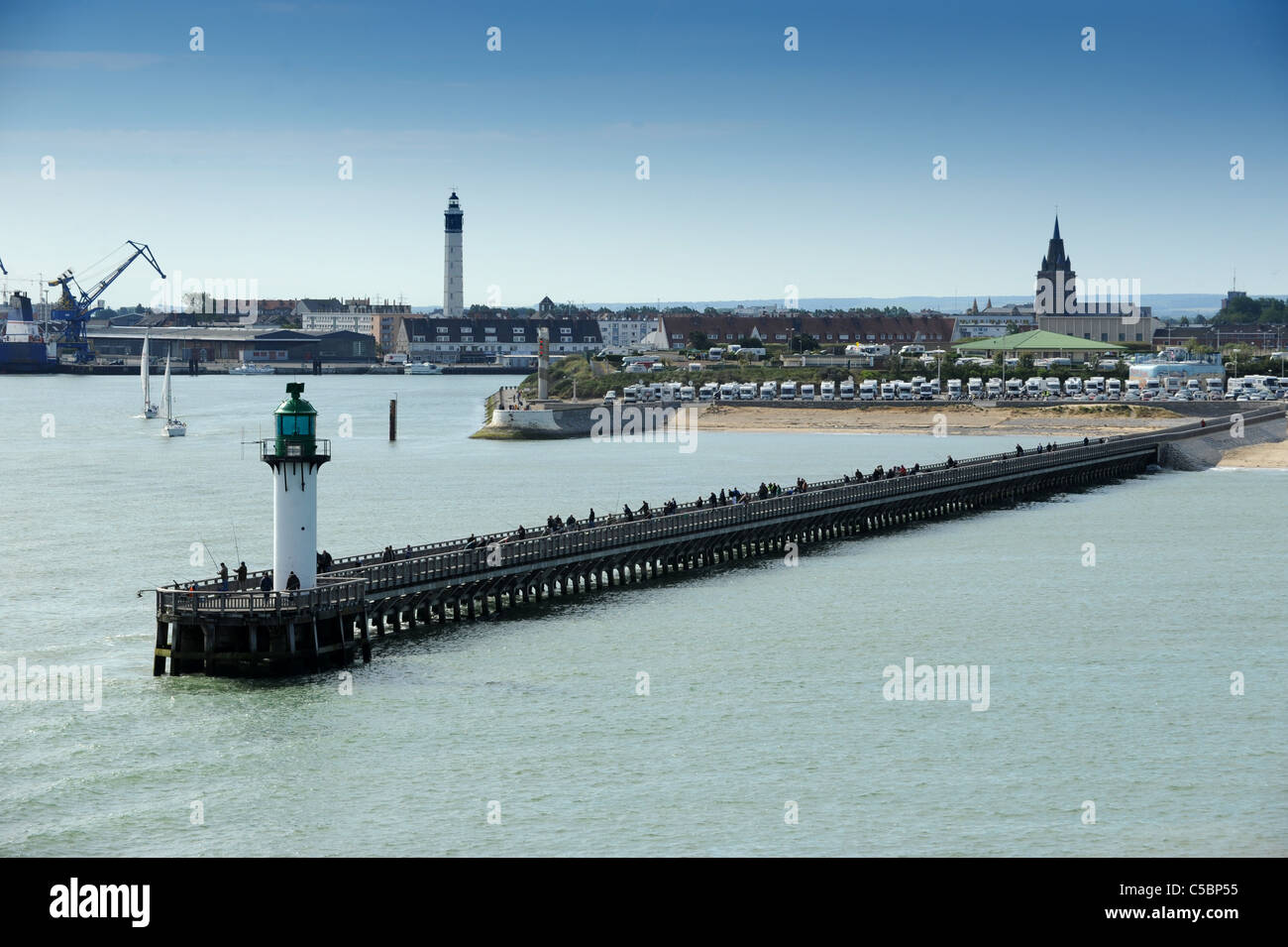 People fishing off Calais harbour pier France Europe Stock Photo - Alamy
