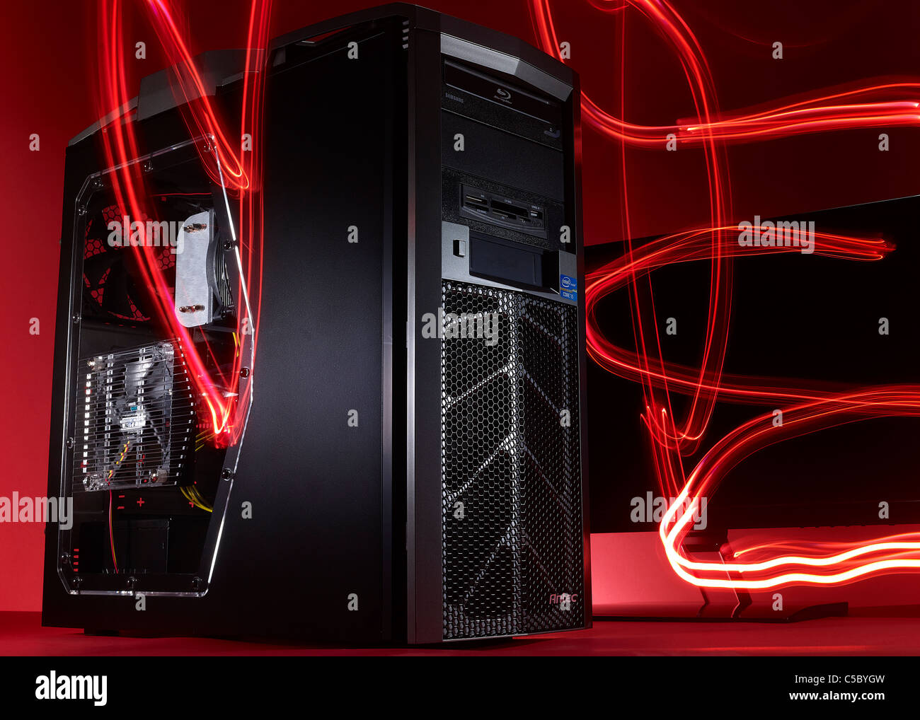 personal computer and monitor with red streaks of light Stock Photo - Alamy