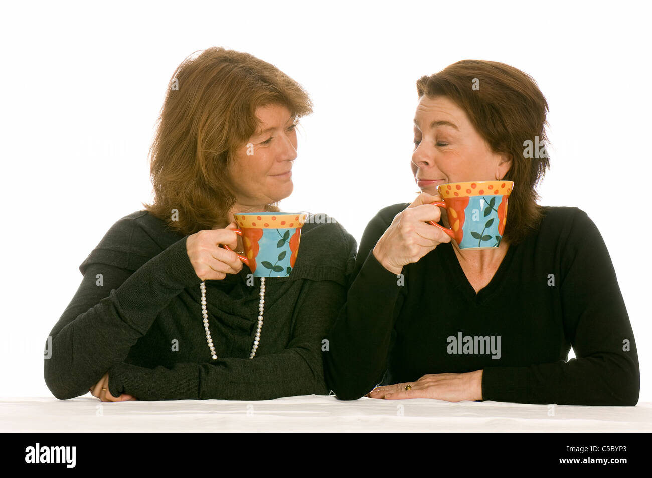 Two women chatting over tea hi-res stock photography and images - Alamy