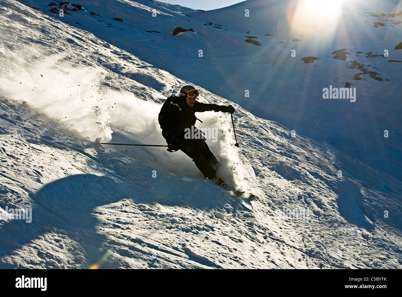 Skier skiing down a slope hi-res stock photography and images - Alamy