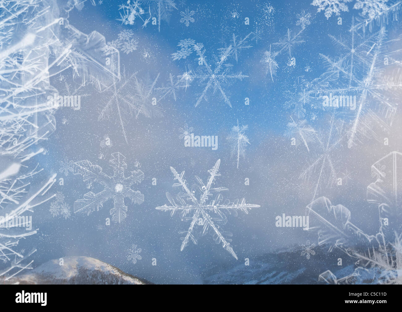 Blue snowflakes background hi-res stock photography and images - Alamy