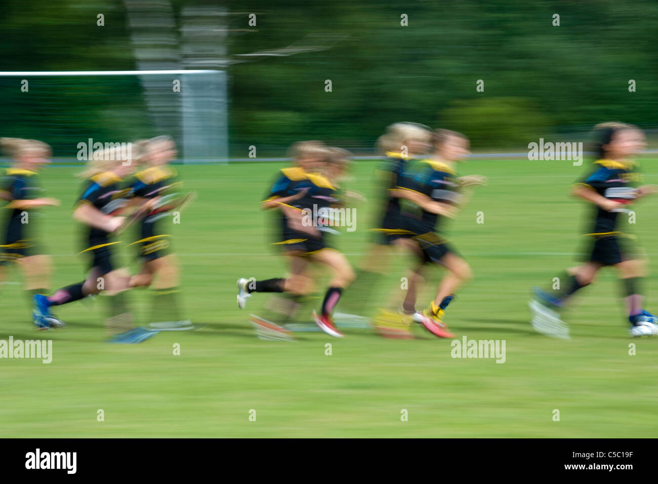 Football action running hi-res stock photography and images - Alamy