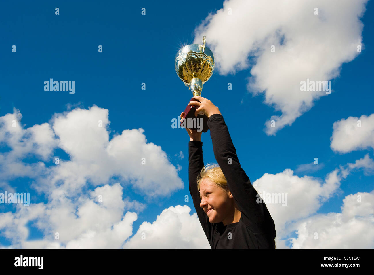 Female gold trophy hi-res stock photography and images - Alamy