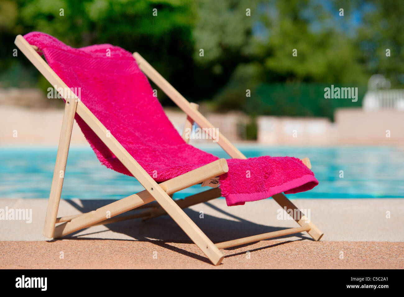 Chair near the swimming pool Stock Photo - Alamy