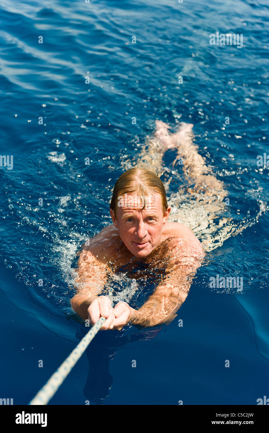 Dragging with a rope hi-res stock photography and images - Alamy