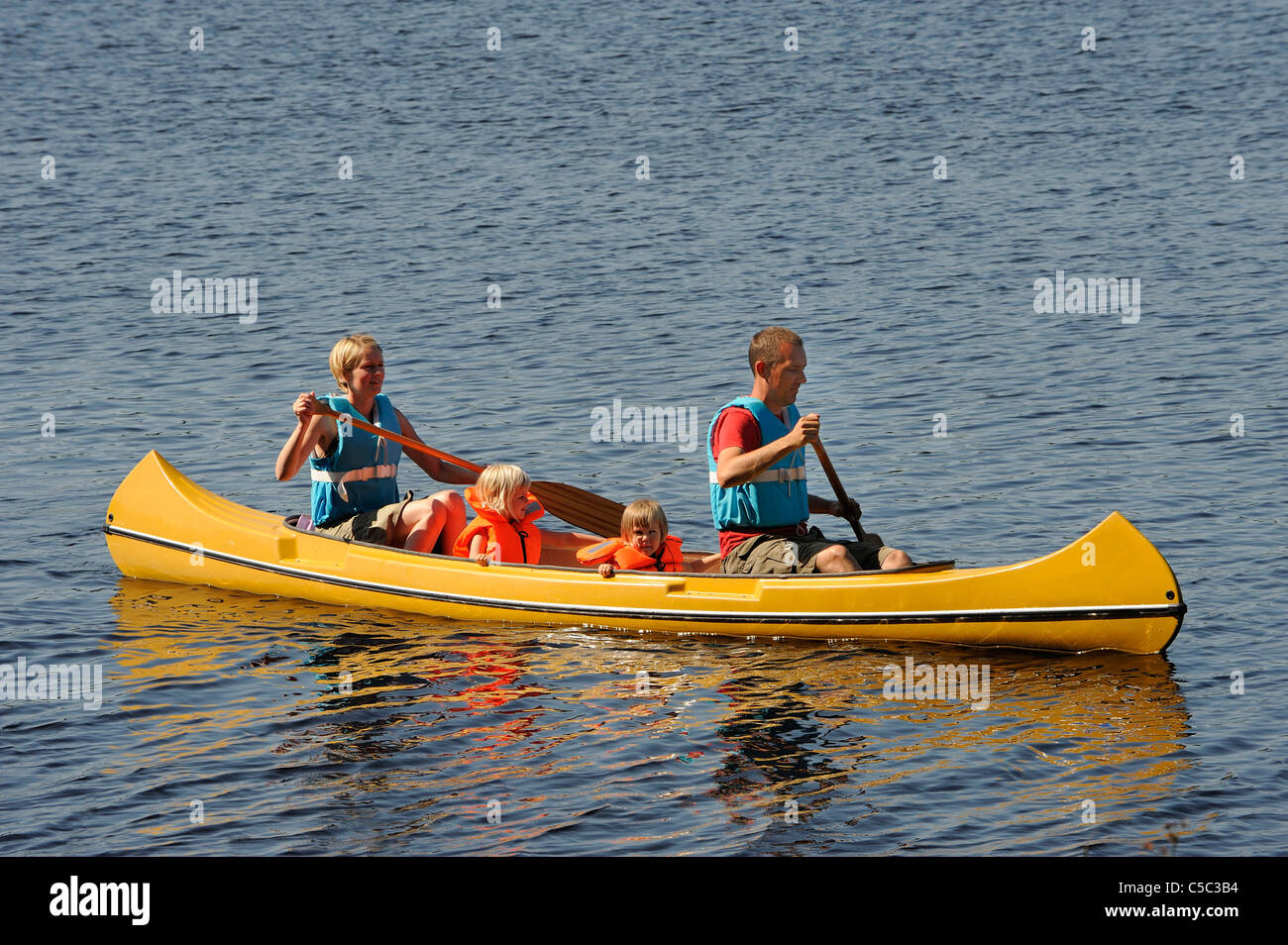 Kids in a canoe hi-res stock photography and images - Alamy