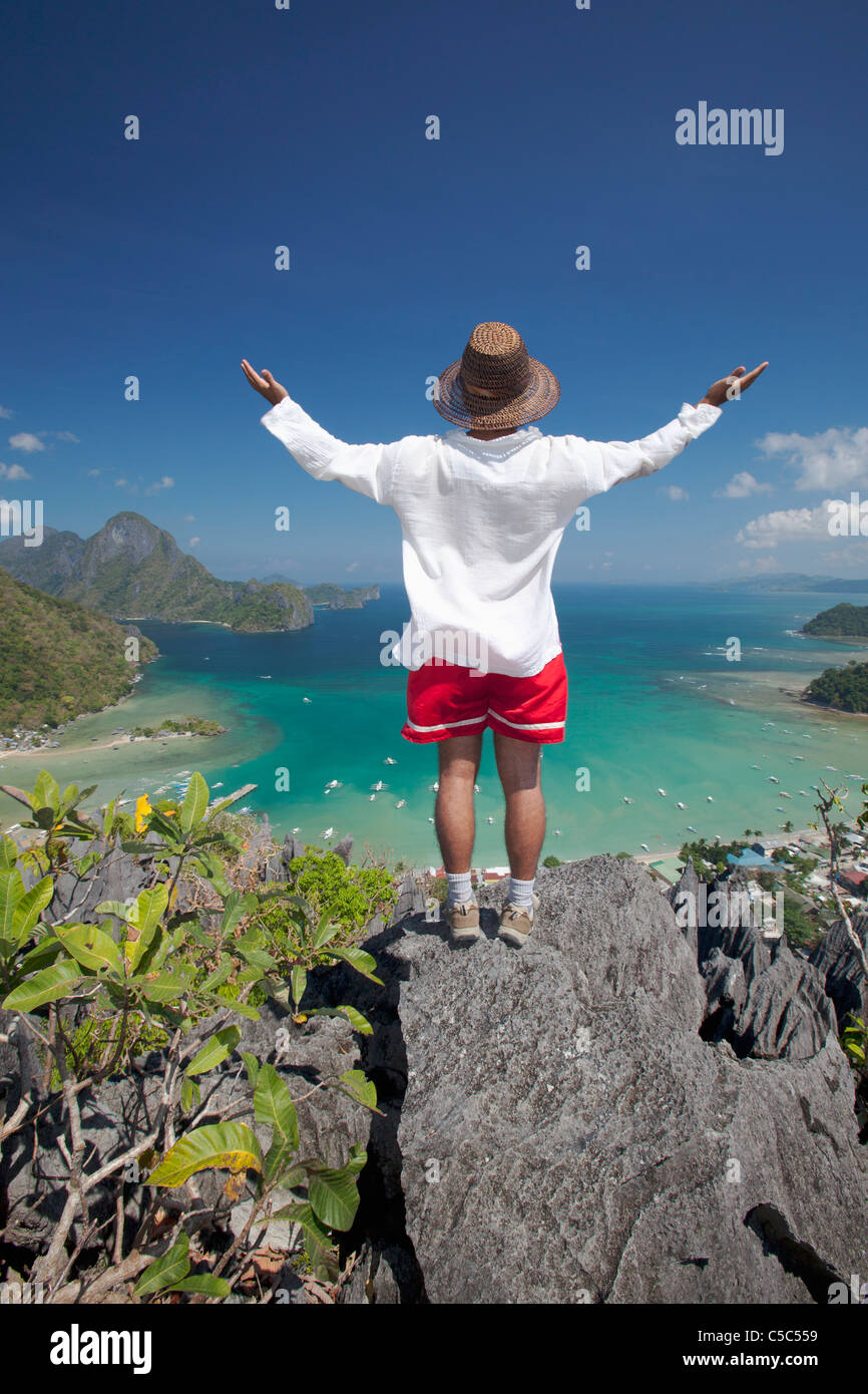Man Standing Above Tropical Water; El Nido, Palawan, Philippines Stock ...