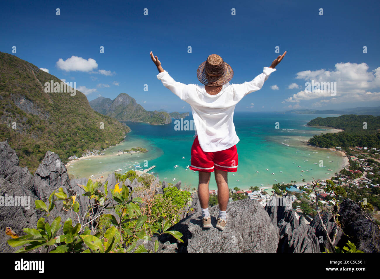 Man Standing Above Tropical Water; El Nido, Palawan, Philippines Stock ...