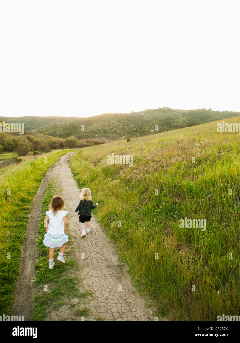 Following girl walking nature trail hi-res stock photography and images ...