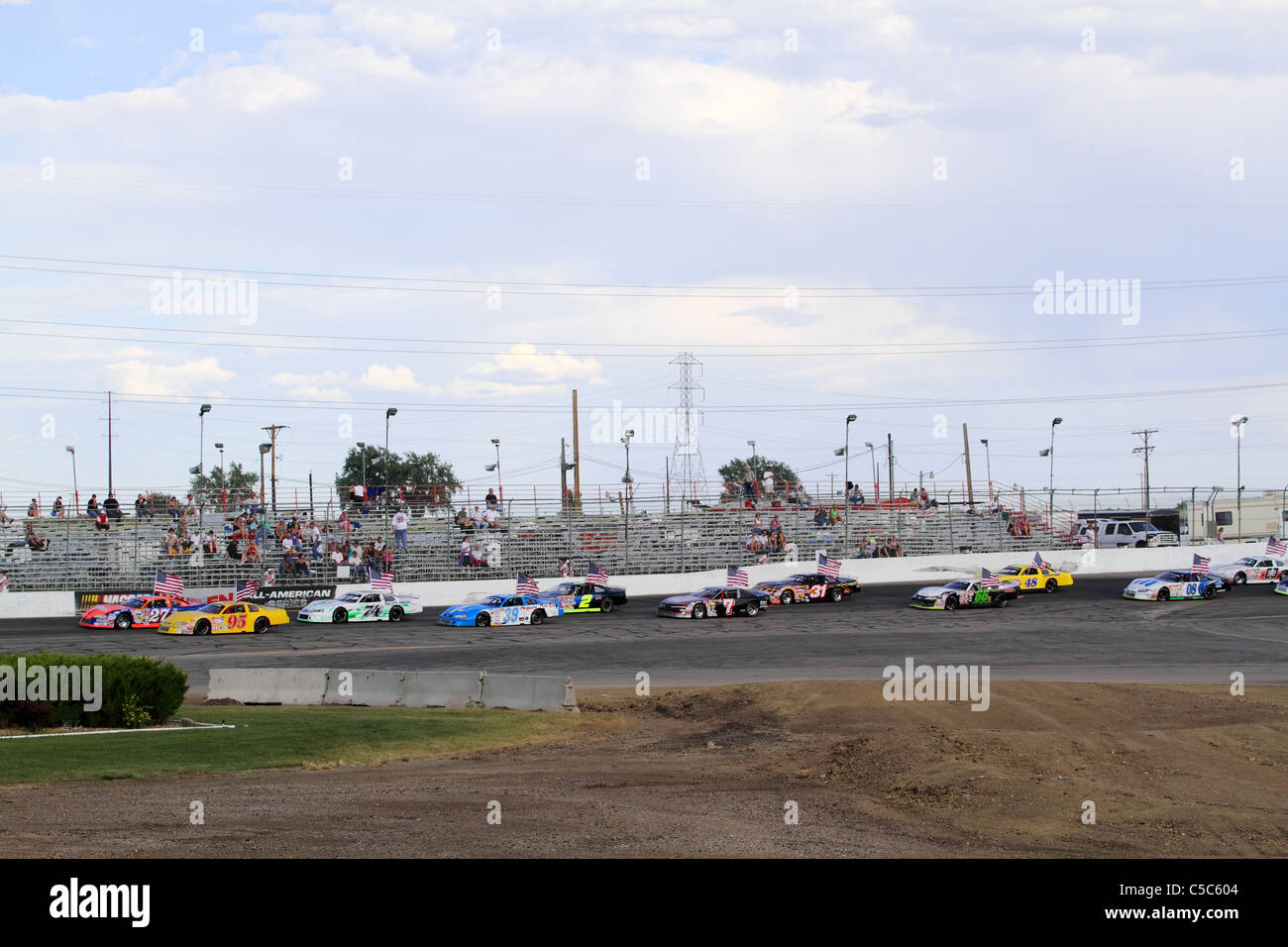 Denver, Colorado - Late Model Corvettes pass the spectator stands ...