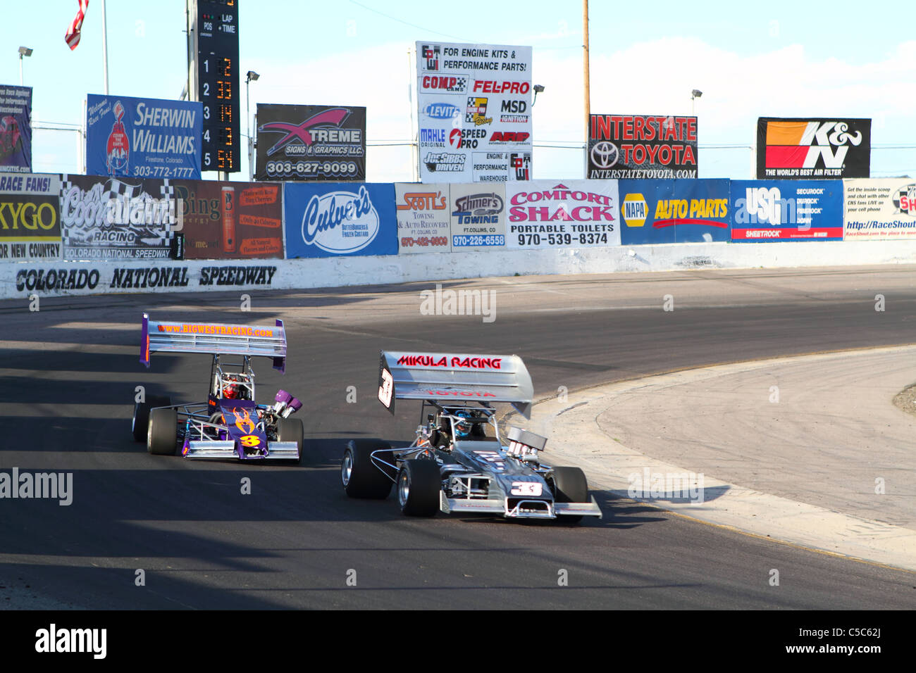 Denver, Colorado - Chris Sheil in the #33 car leads Harold Evans in the ...